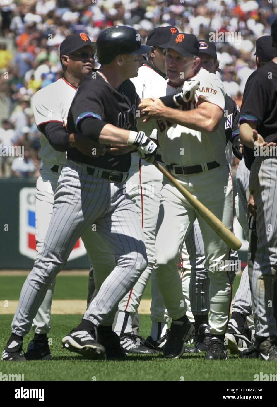 Jul 22, 2001; San Francisco, CA, USA; Arizona's Matt Williams is held ...