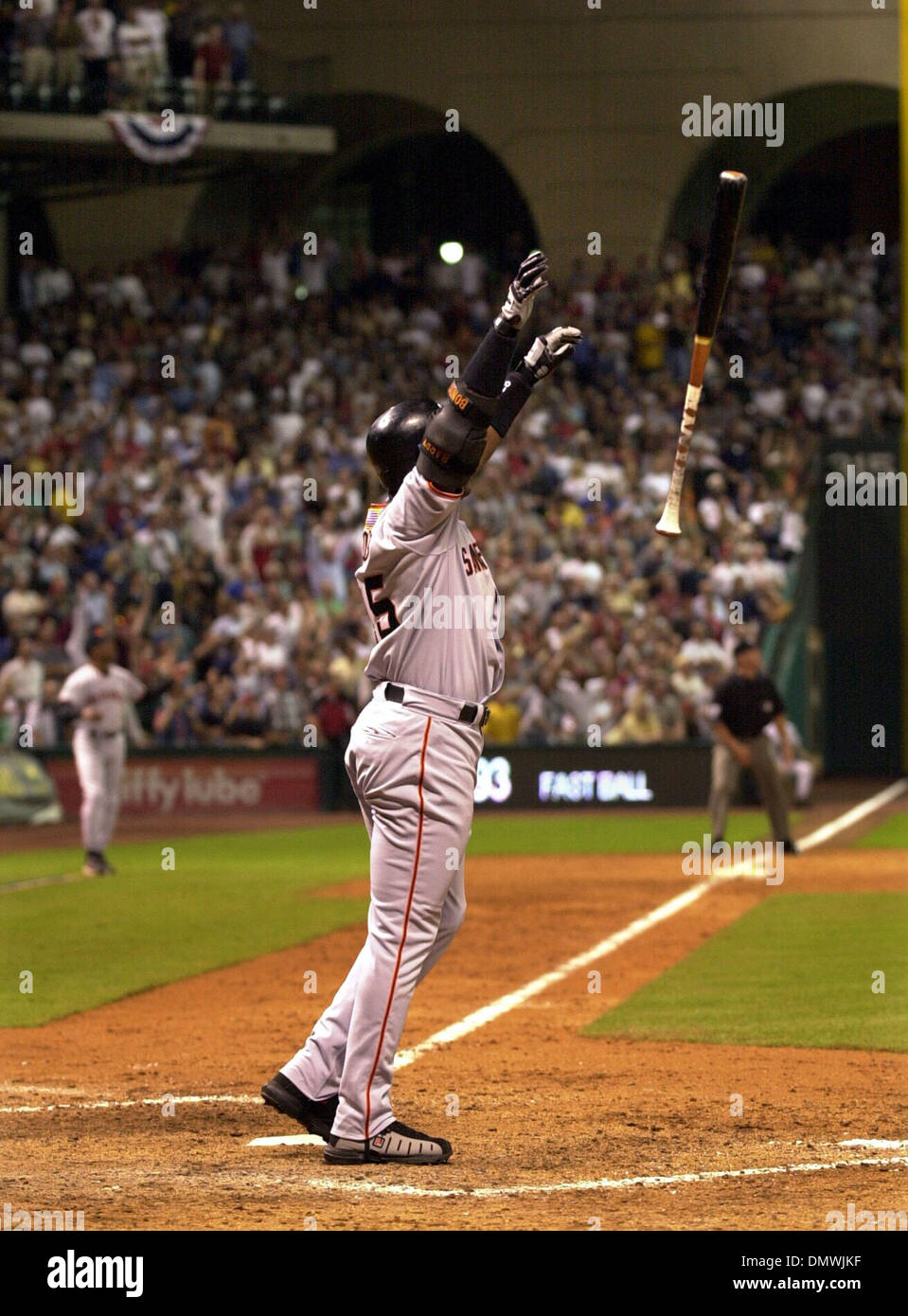 Oct 04, 2001; Houston, TX, USA; Barry Bonds lets the bat fly after ...