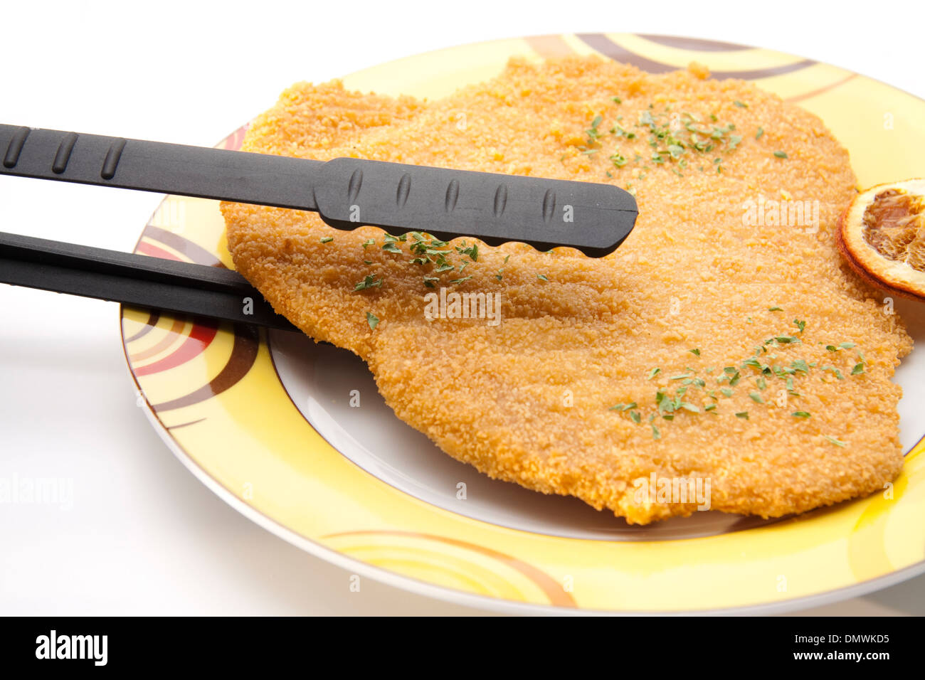 Pigs shred with grill tongs Stock Photo - Alamy