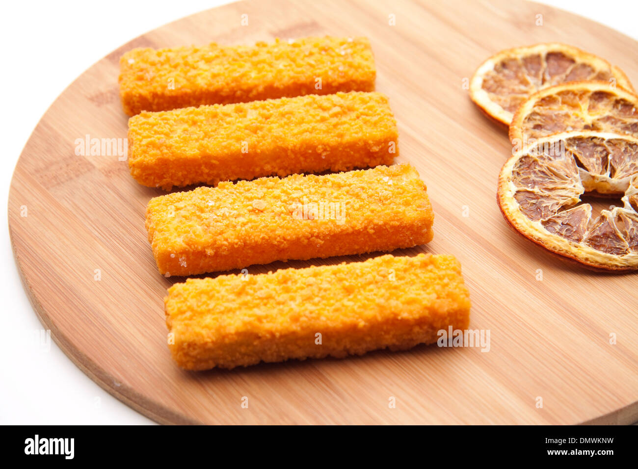 Fish sticks with wooden plate Stock Photo - Alamy