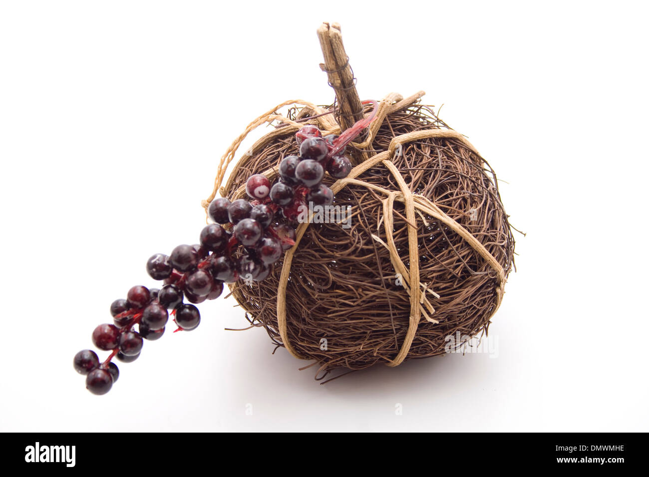 Straw ball with berry branch Stock Photo - Alamy