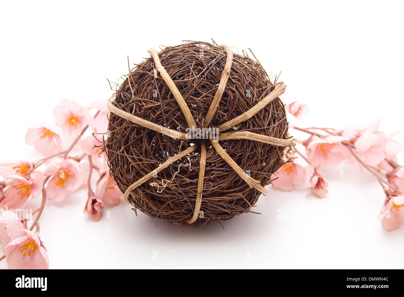 Straw ball with flowering branch Stock Photo - Alamy