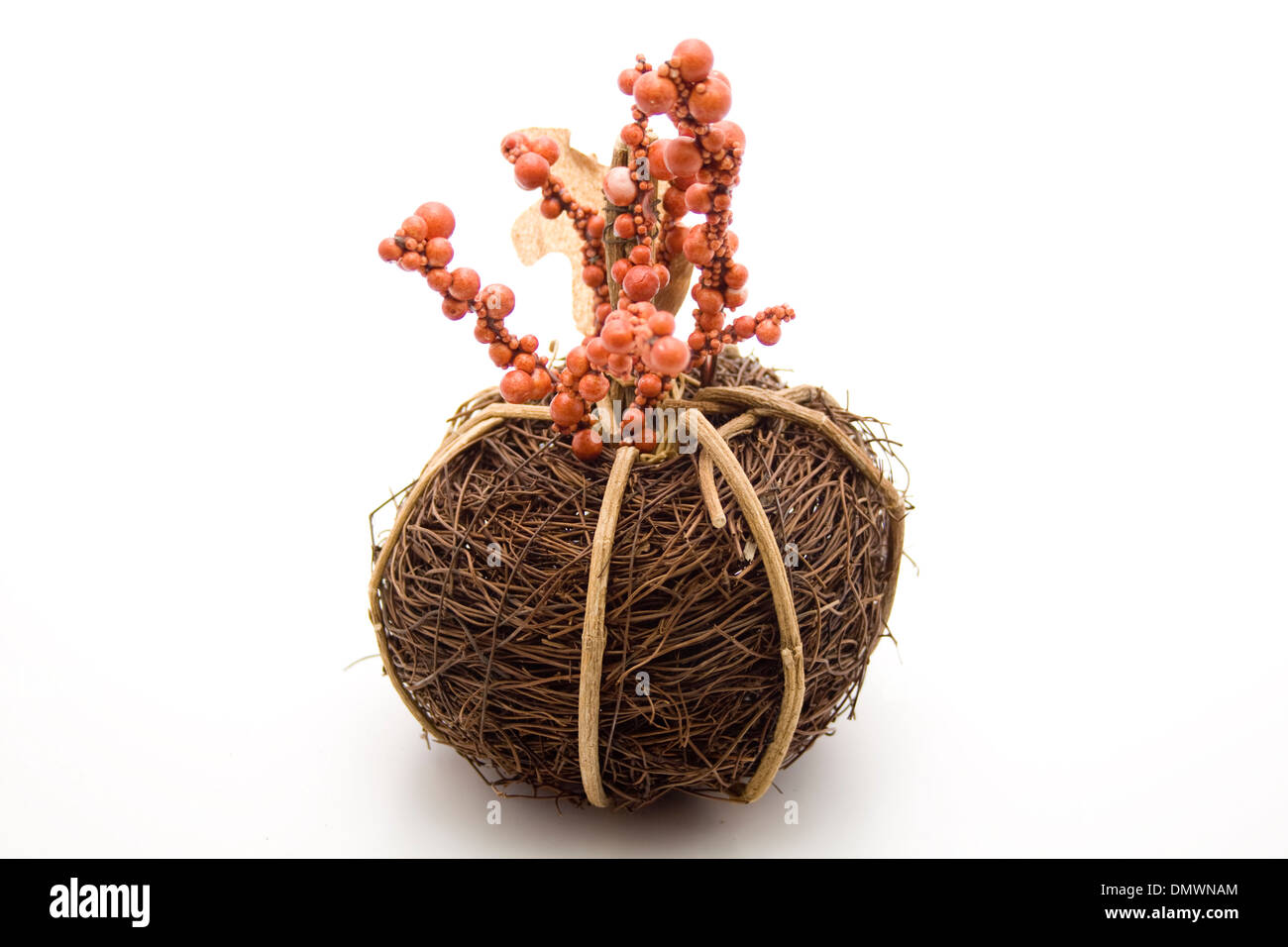 Straw ball with berry branch Stock Photo - Alamy