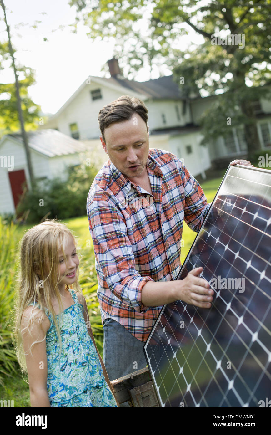 Checking solar hi-res stock photography and images - Alamy