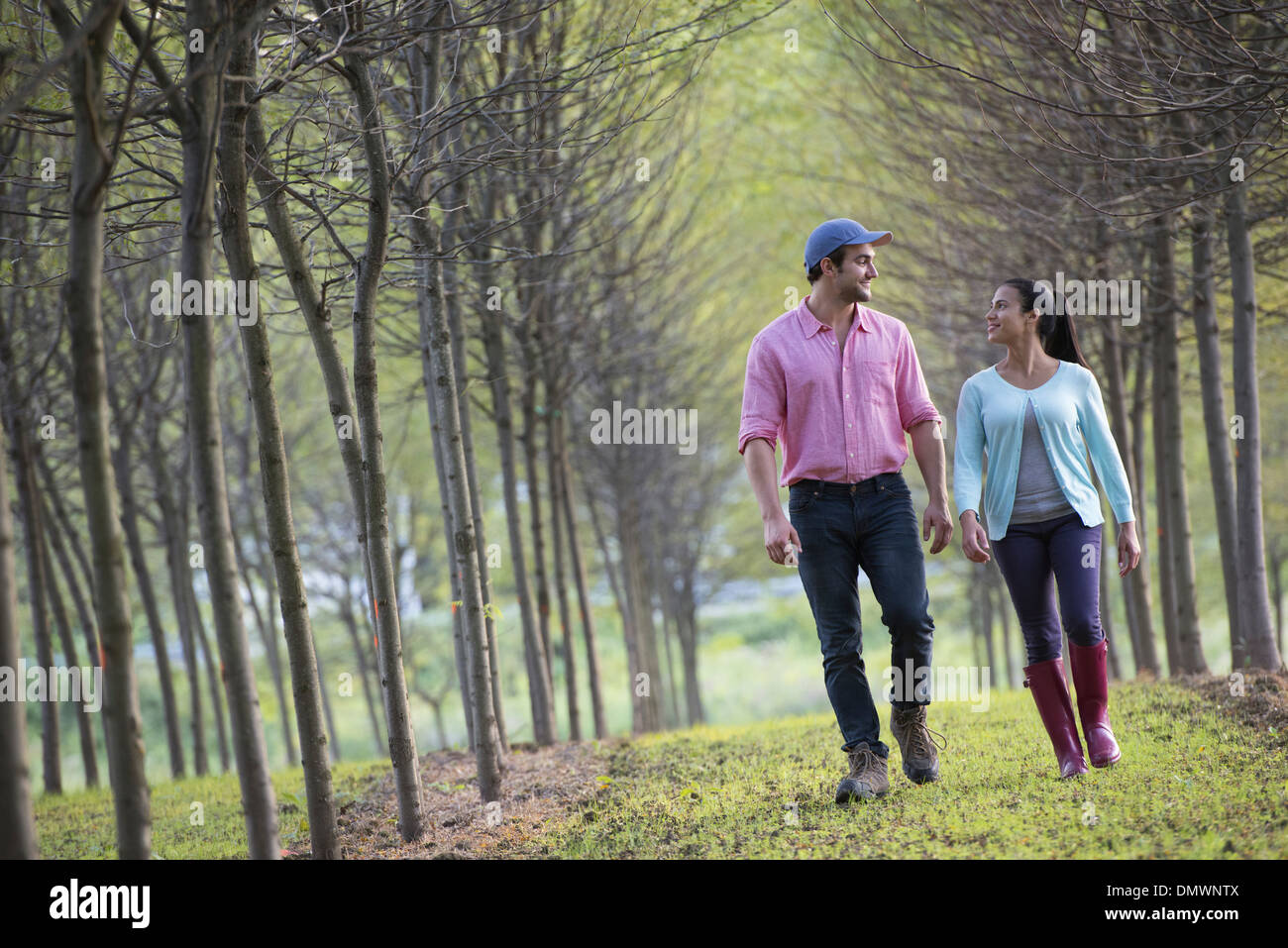 Young man walking between hi-res stock photography and images - Alamy