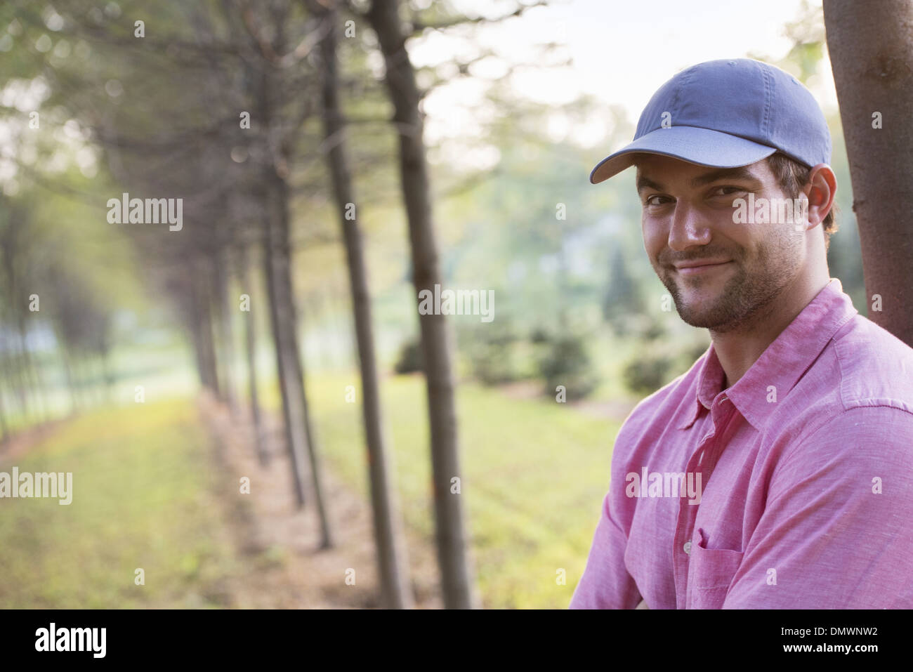 Leaning against a tree hi-res stock photography and images - Alamy