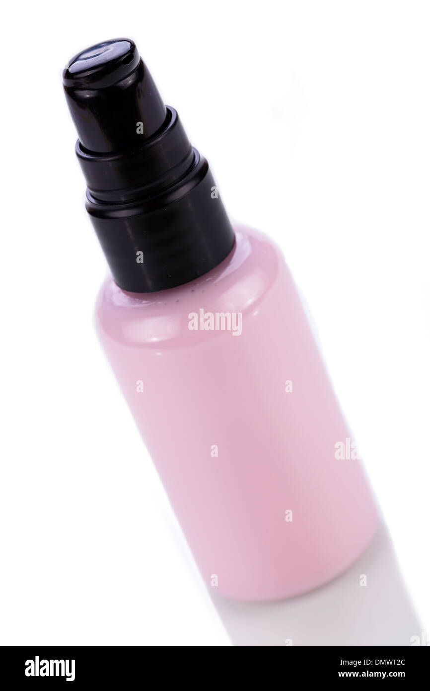 pink plastic bottle of cosmetic cream isolated on white product object ...