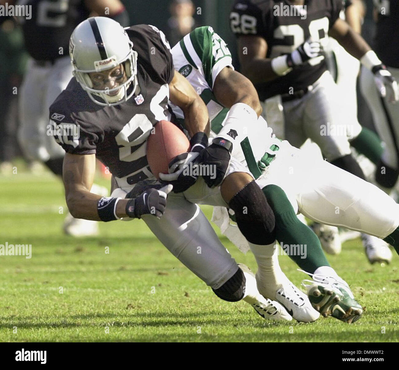 Jan 06, 2002; Oakland, CA, USA; Oakland Raiders' Jerry Rice is brought ...