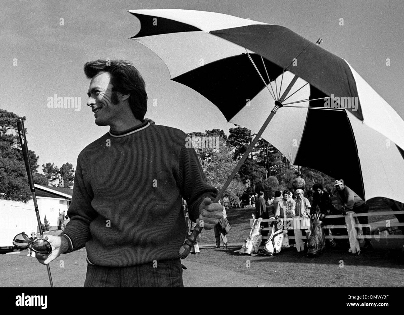 Clint Eastwood with sunglasses and umbrella at Pebble Beach during the ...
