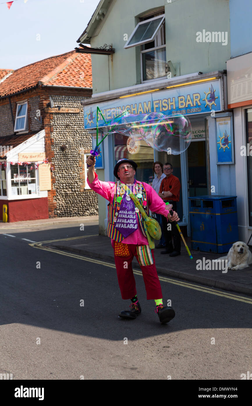 Clown blowing bubbles hi-res stock photography and images - Alamy