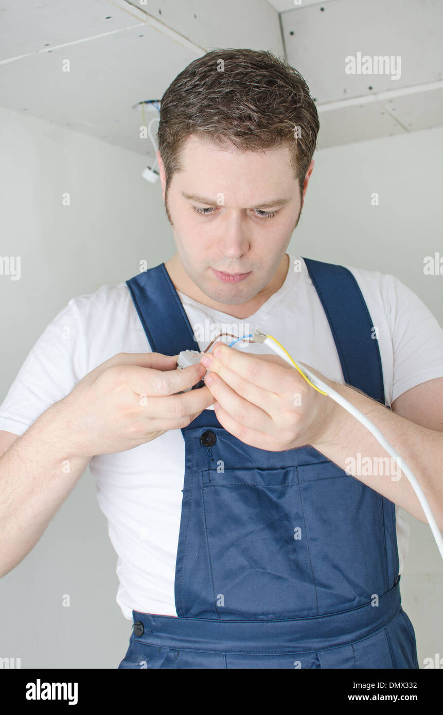 Professional electrician troubleshooting electric hi-res stock ...