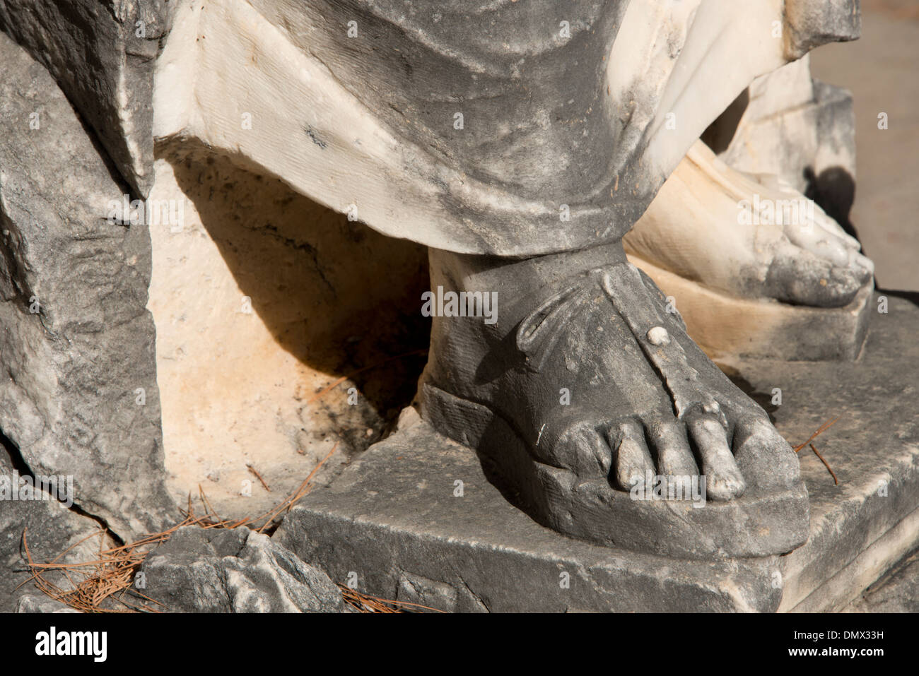 Greece, Corinth, Ancient Corinth. Carved marble statue, detail of feet ...