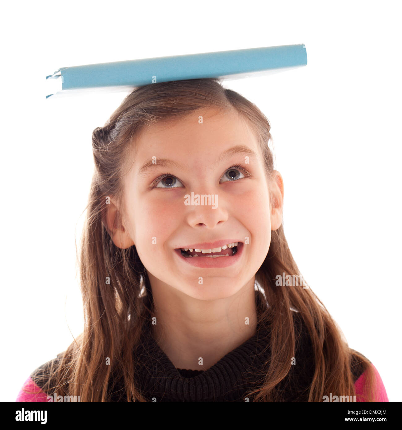 Children balancing book on head hi-res stock photography and images - Alamy