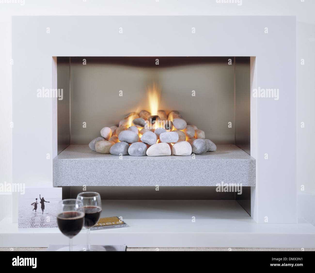 Modern style fireplace Stock Photo - Alamy