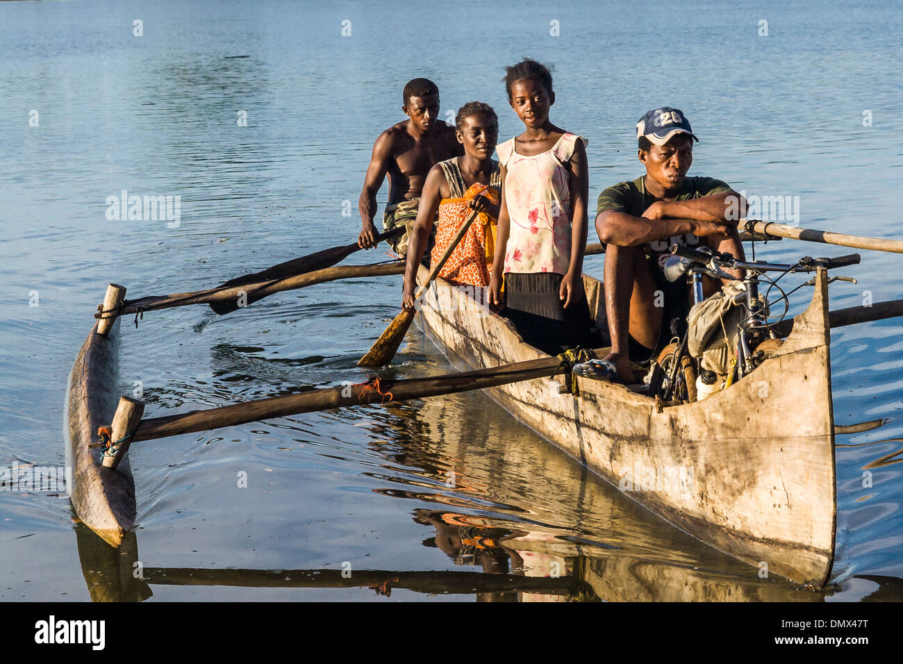 Native in outrigger canoe hi-res stock photography and images - Alamy