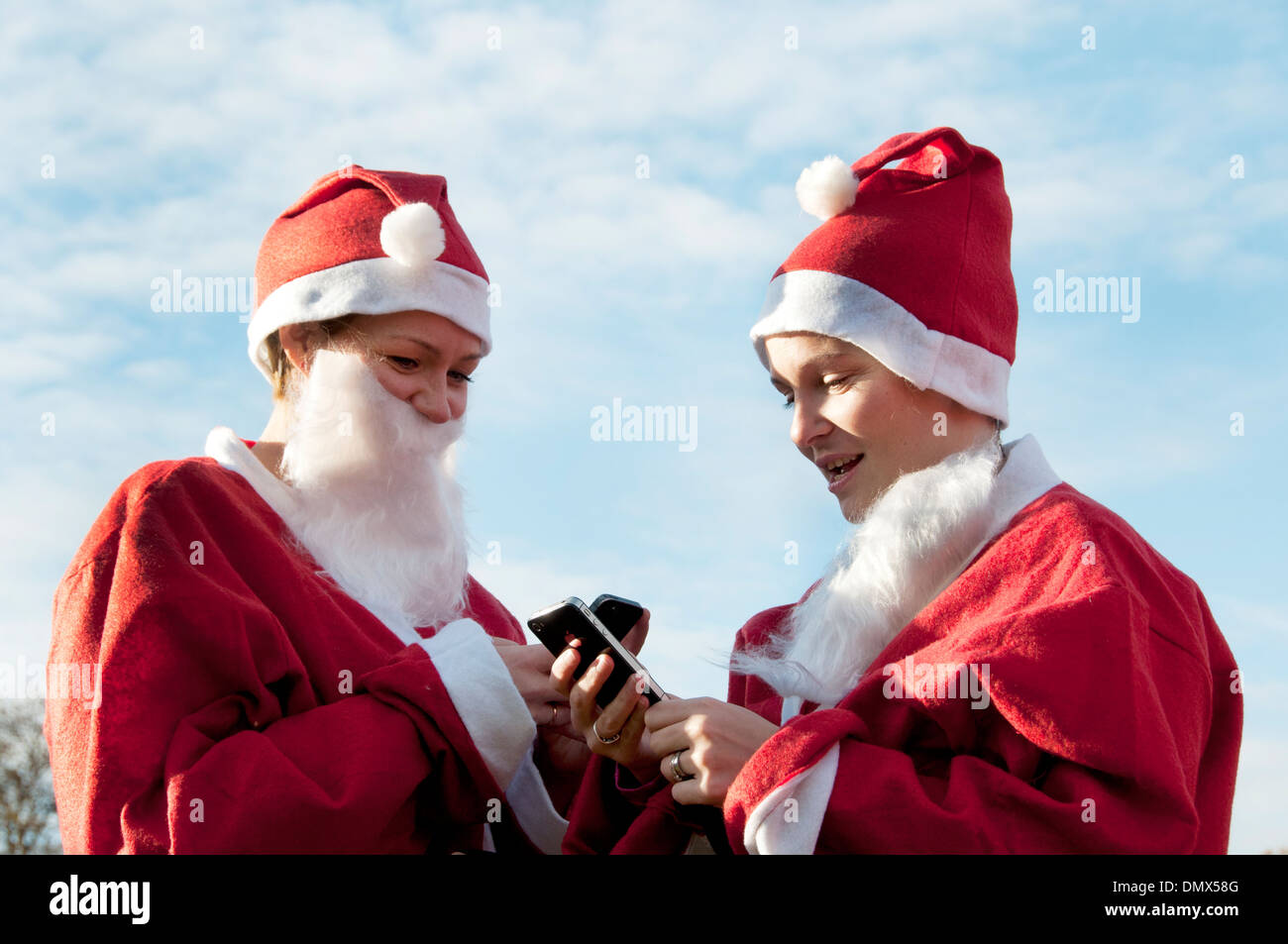 In santa suits hi-res stock photography and images - Alamy