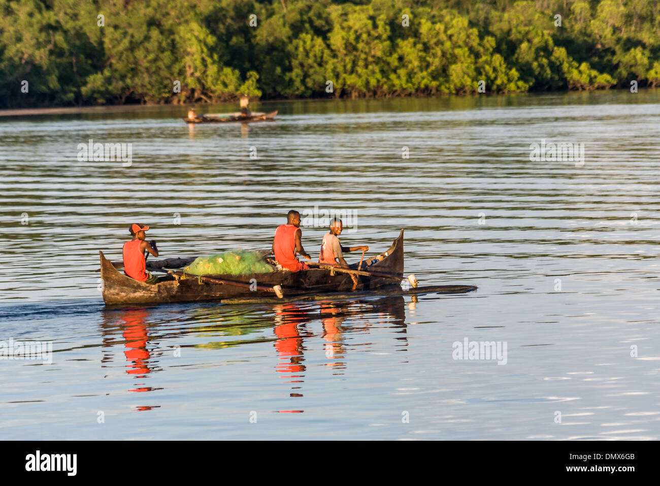 Native in outrigger canoe hi-res stock photography and images - Alamy