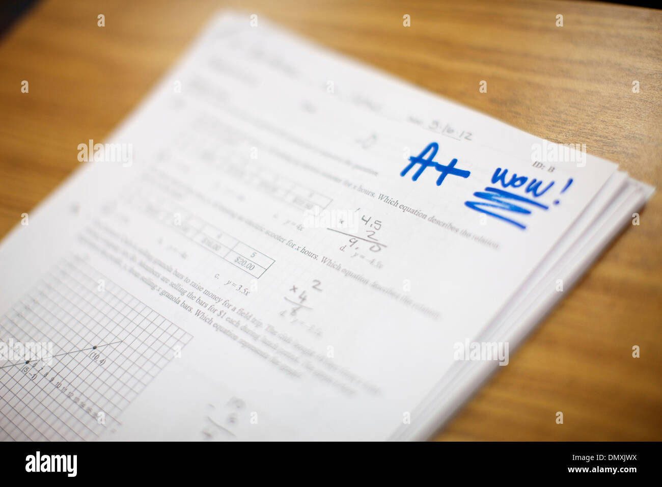 A test is returned to a student with a great grade of A+ Stock Photo ...