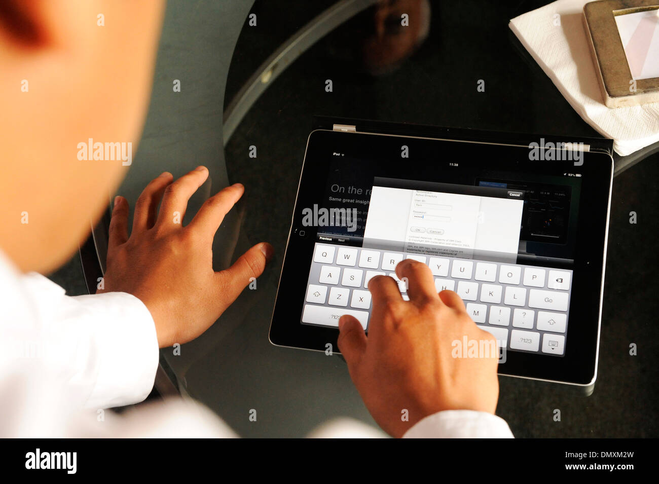 Inputting information onto a tablet computer Stock Photo - Alamy