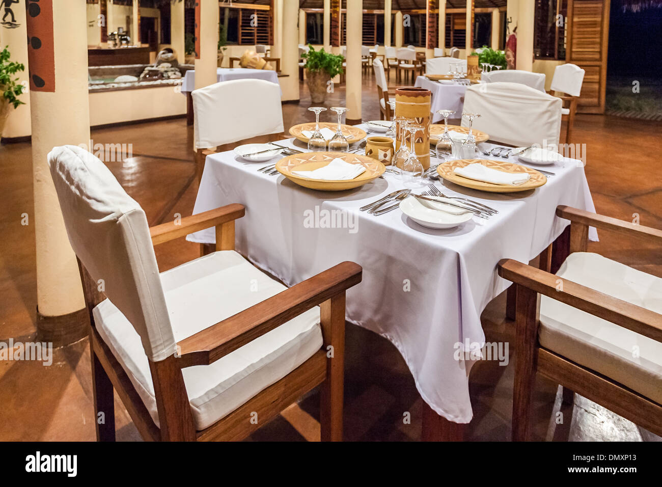 Table of a tropical restaurant in a luxury hotel Stock Photo - Alamy