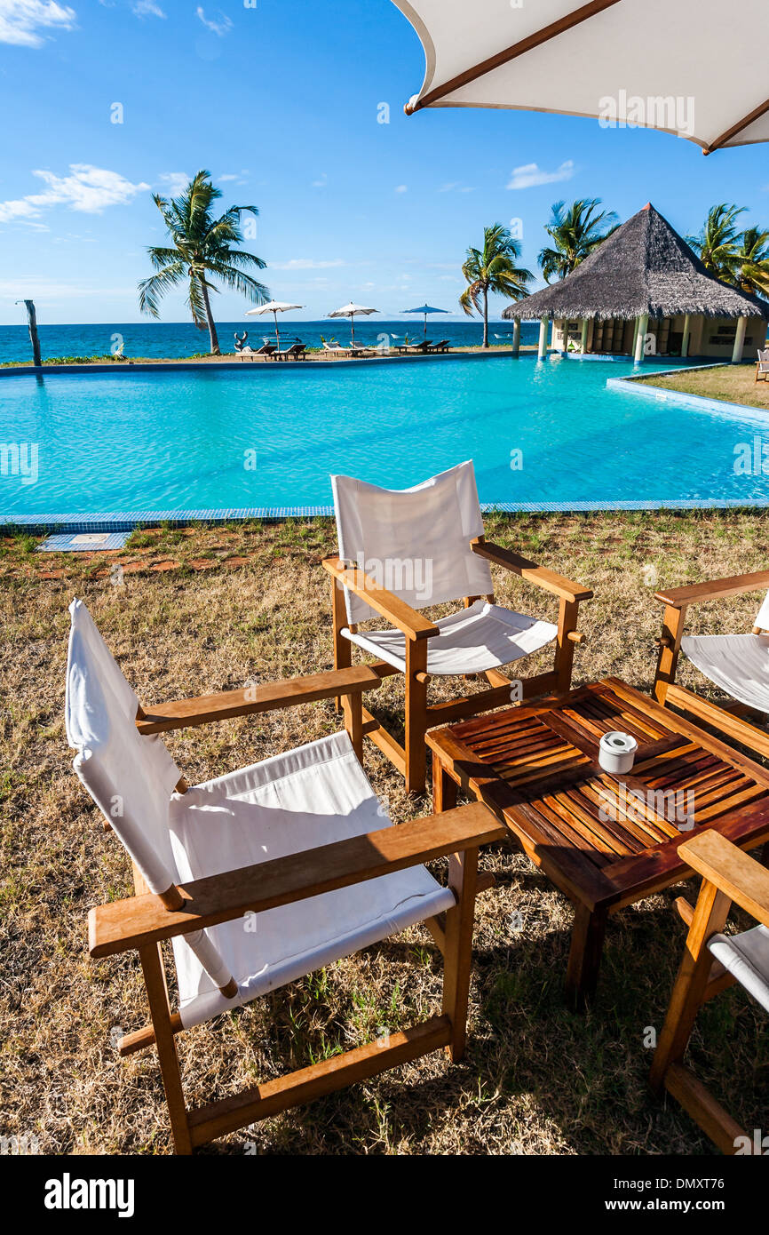Cafe and swimming pool on the tropical beach Stock Photo - Alamy
