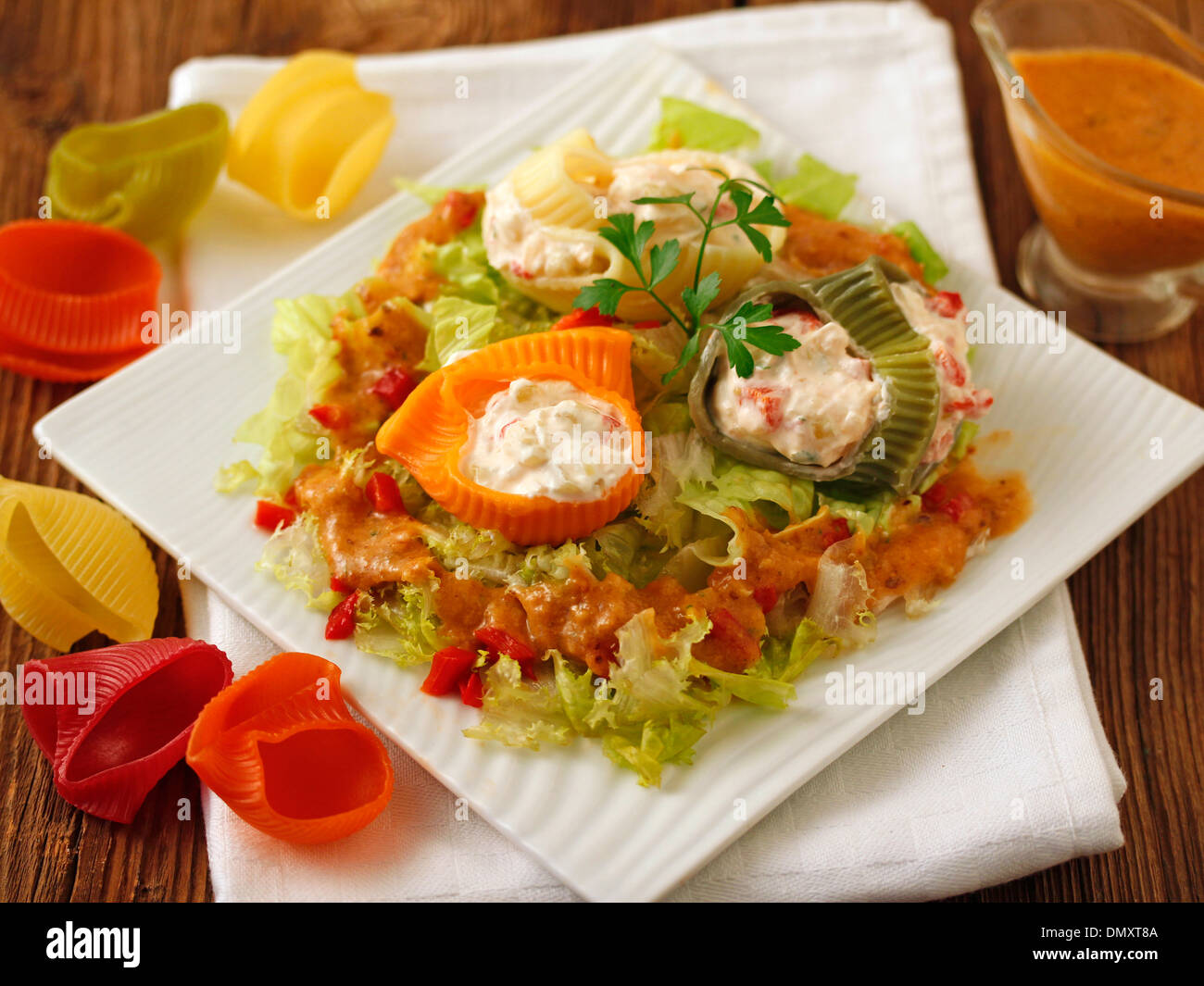 Stuffed pipe rigate with salad. Recipe available Stock Photo - Alamy