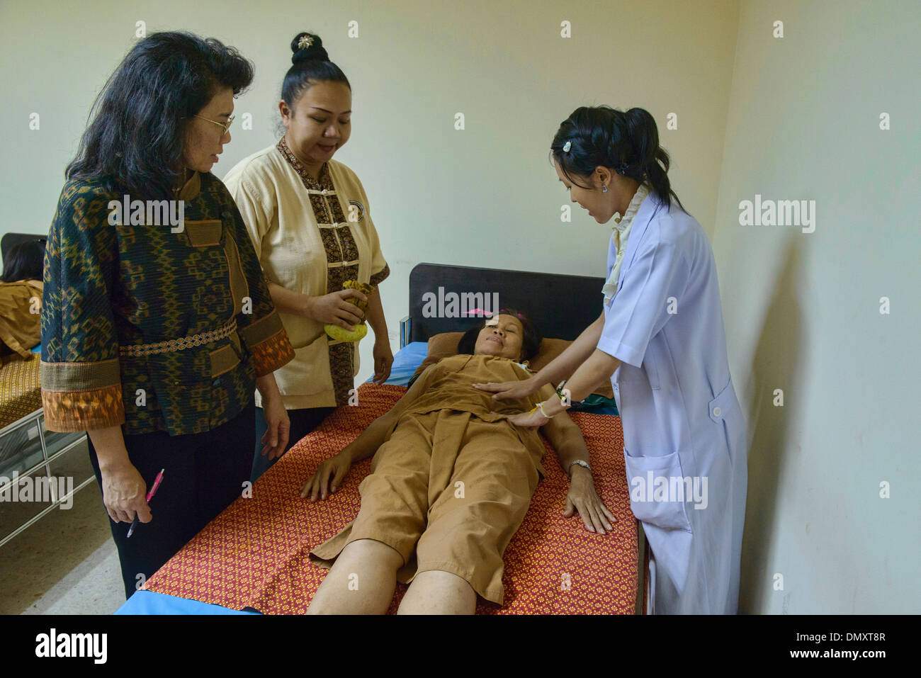 herbal compress massage treatment at a traditional Thai medicine clinic ...