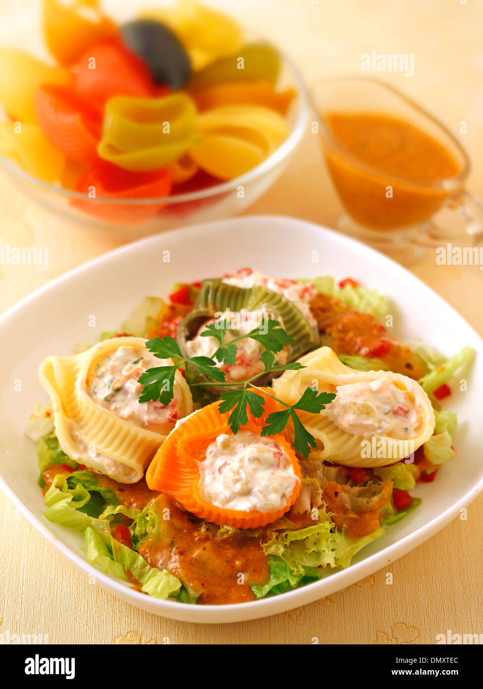 Stuffed pipe rigate with salad. Recipe available Stock Photo - Alamy