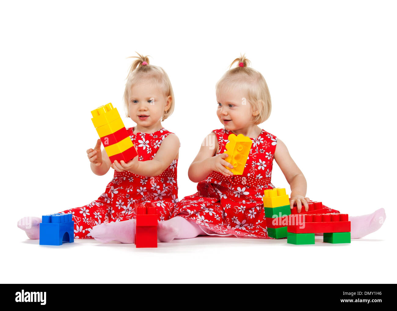 Girls in identical dresses hi-res stock photography and images - Alamy