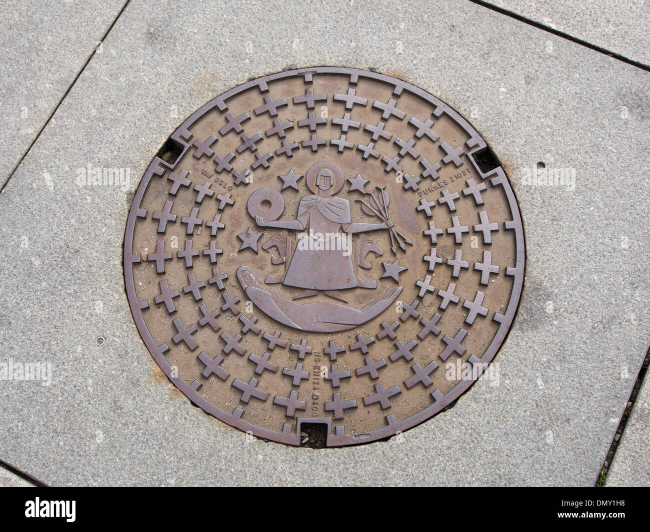 Karl Johans gate Oslo Norway, manhole cover with the city's coat of ...