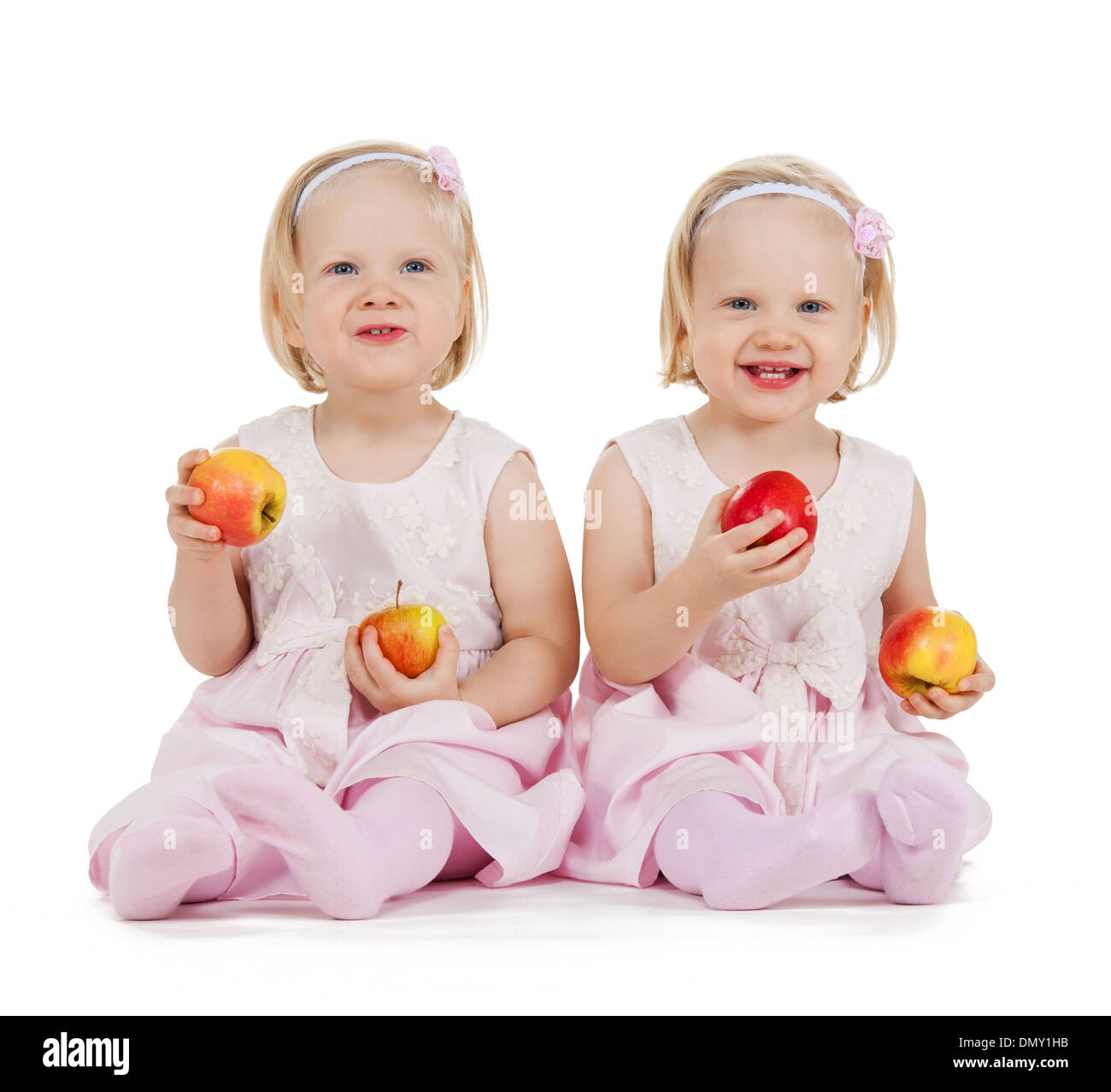 Identical twins Cut Out Stock Images & Pictures - Alamy