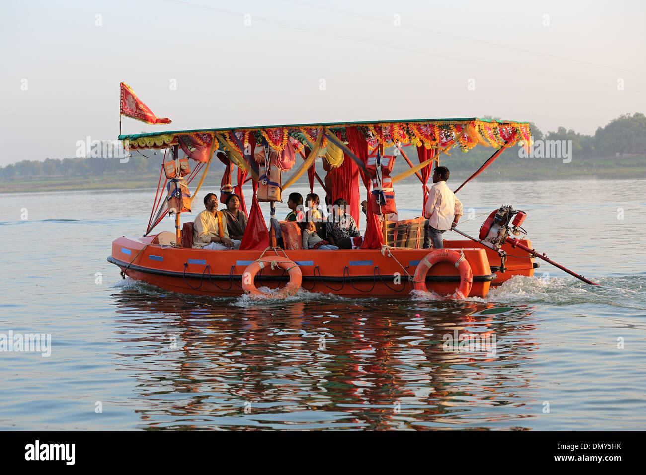 Boat with pilgrims at the Narmada River Maheshwar Madhya Pradesh India ...