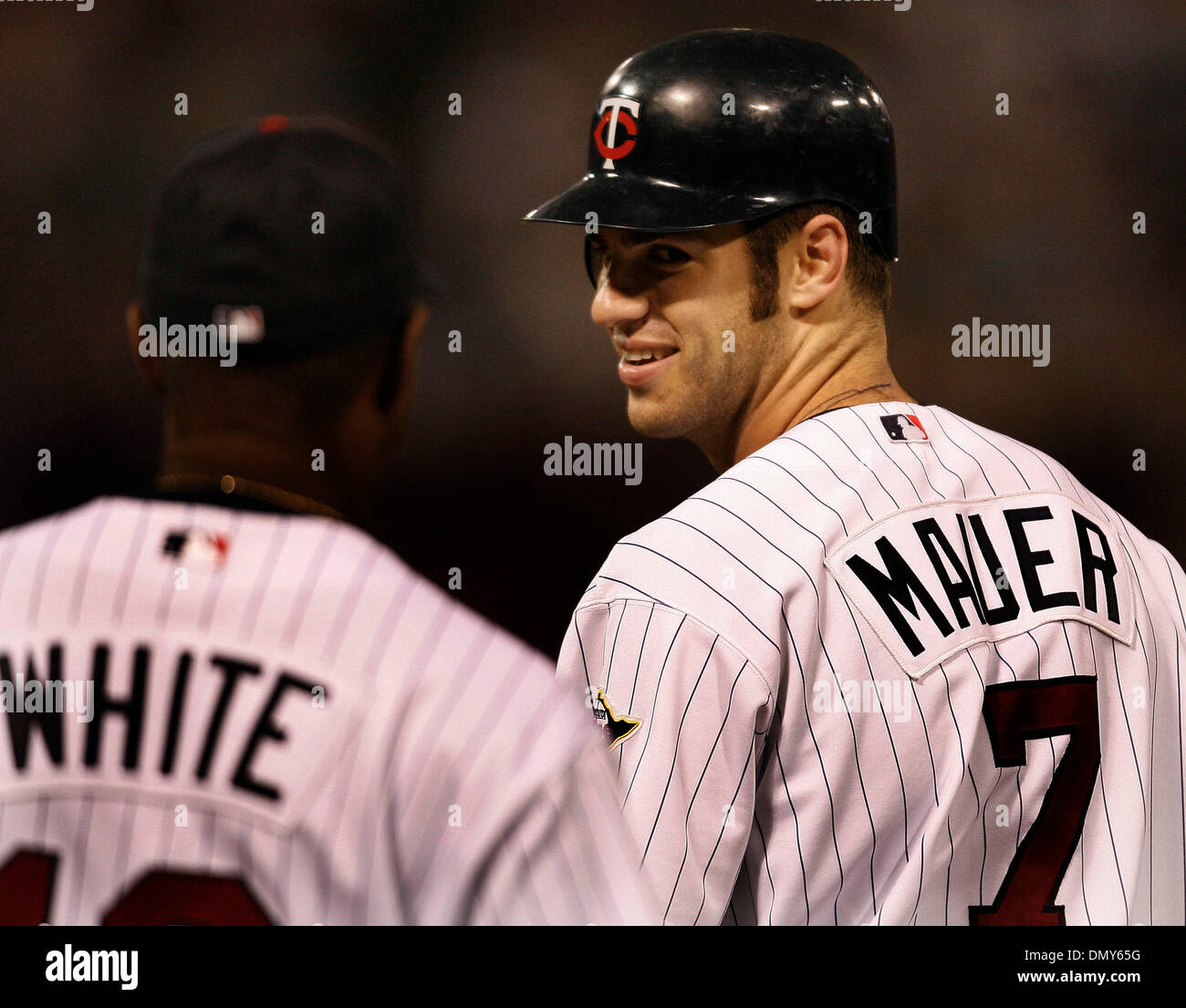 Jun 27, 2006; Minneapolis, MN, USA; Joe Mauer shares laugh with Twins ...