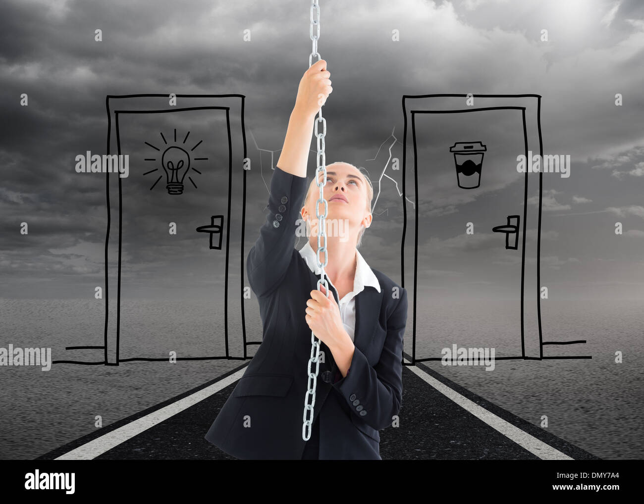 Composite image of businesswoman pulling a chain Stock Photo - Alamy