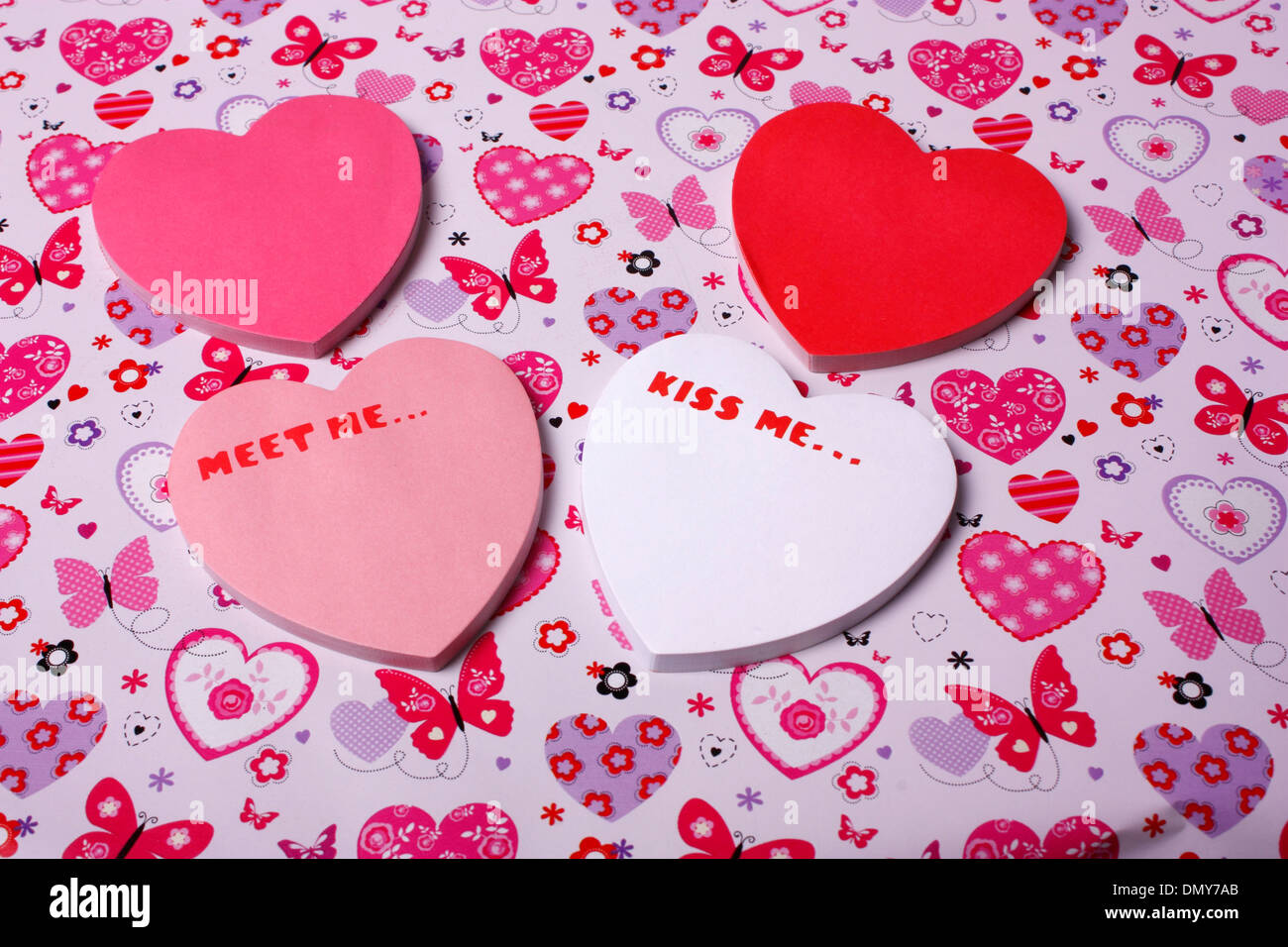 An image showing the concept of Valentines day with heart shaped Paper ...