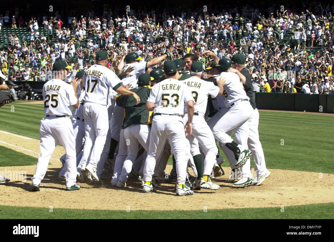 Jul 30, 2006; Oakland, CA, USA; A's players mob teammate Milton Bradley ...