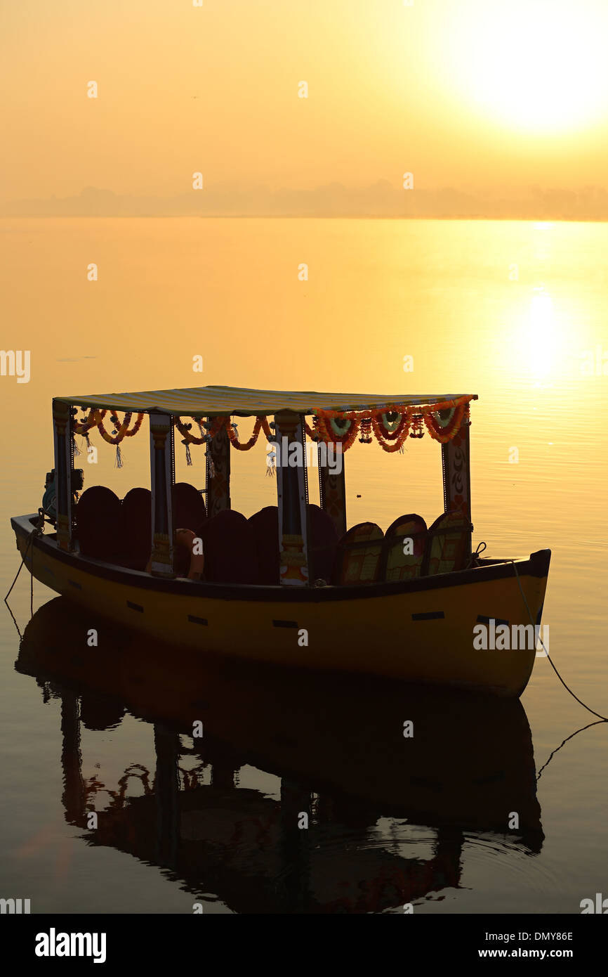 Boat at sunrise at the Narmada River Maheshwar Madhya Pradesh India ...