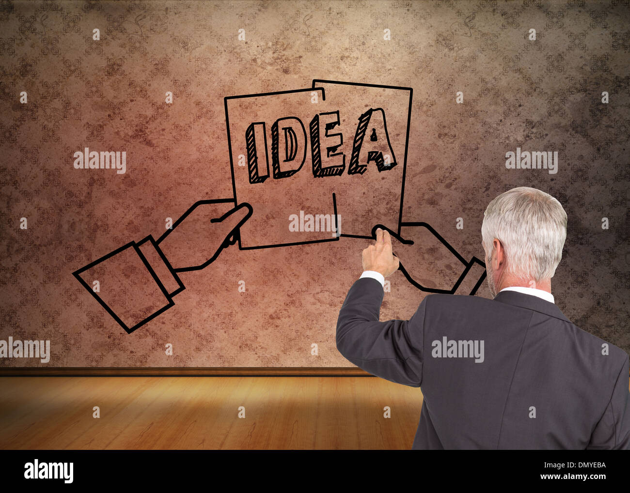 Composite image of rear view of stylish mature businessman pointing ...