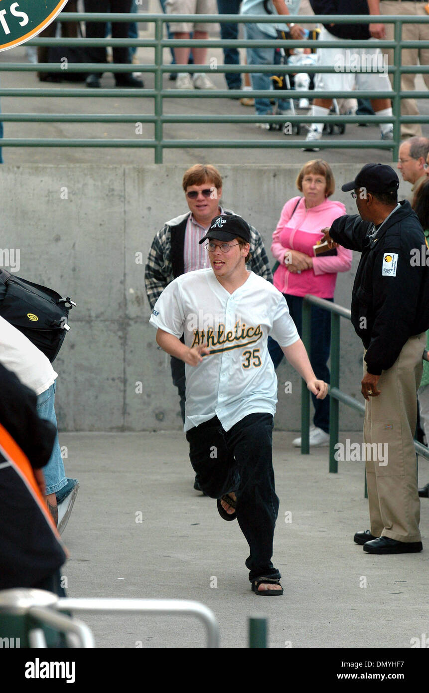Sep 25, 2006; Oakland, CA, USA; A very excited BRYCE HERMAN runs to an ...