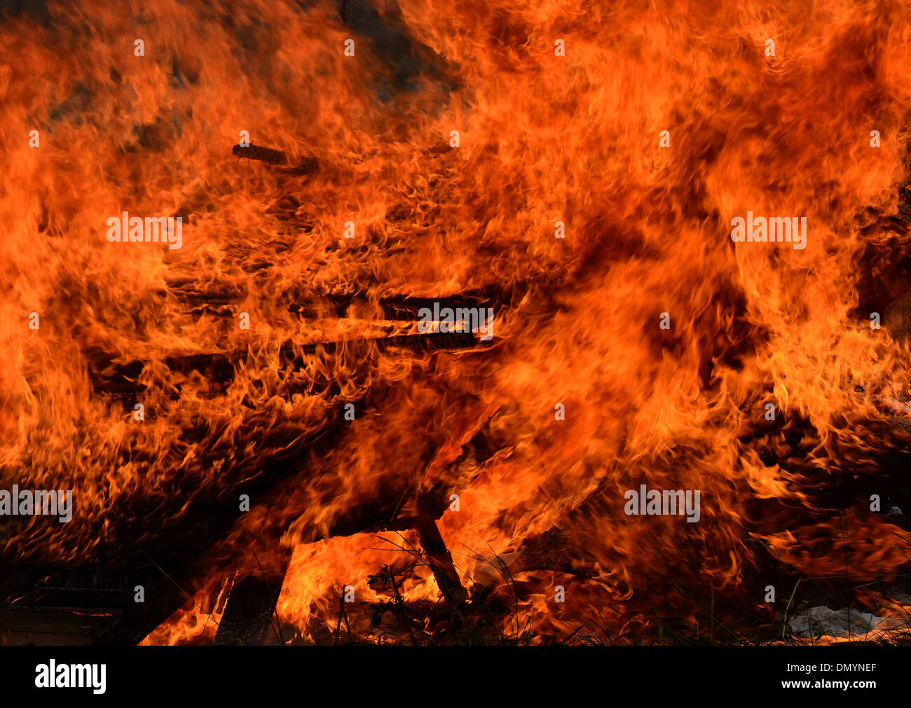 Bright orange flames of a bonfire Stock Photo - Alamy
