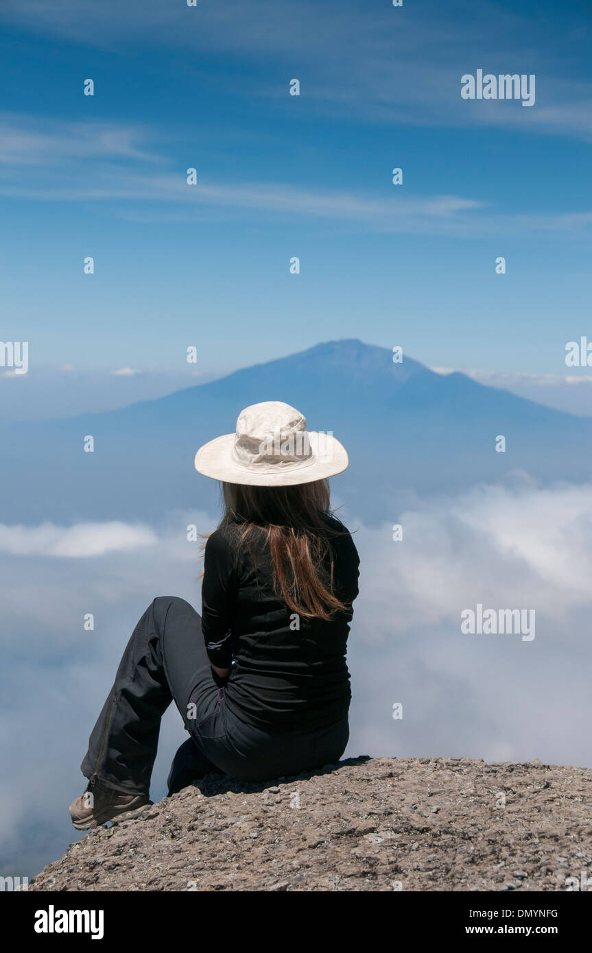 Looking over the clouds to Mount Meru from the slopes of Kilimanjaro ...