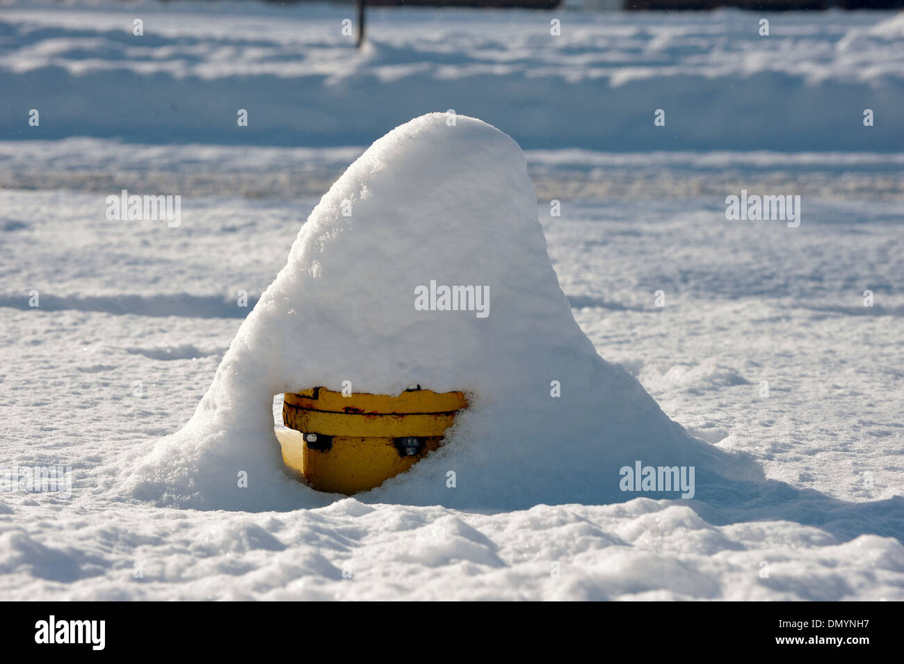 A Canadian fire hydrant covered in snow Stock Photo - Alamy