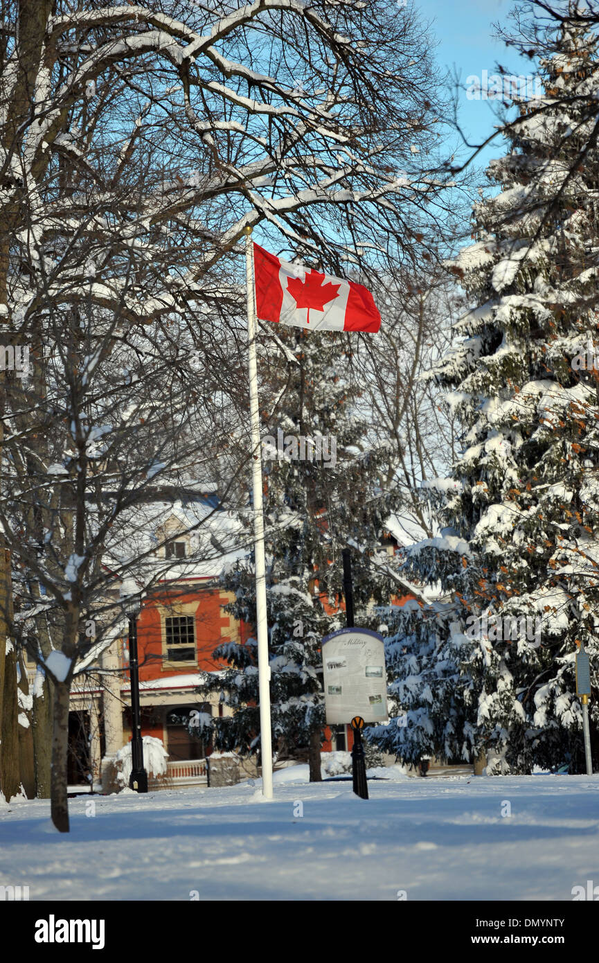 The Canadian flag in snowy surroundings Stock Photo - Alamy