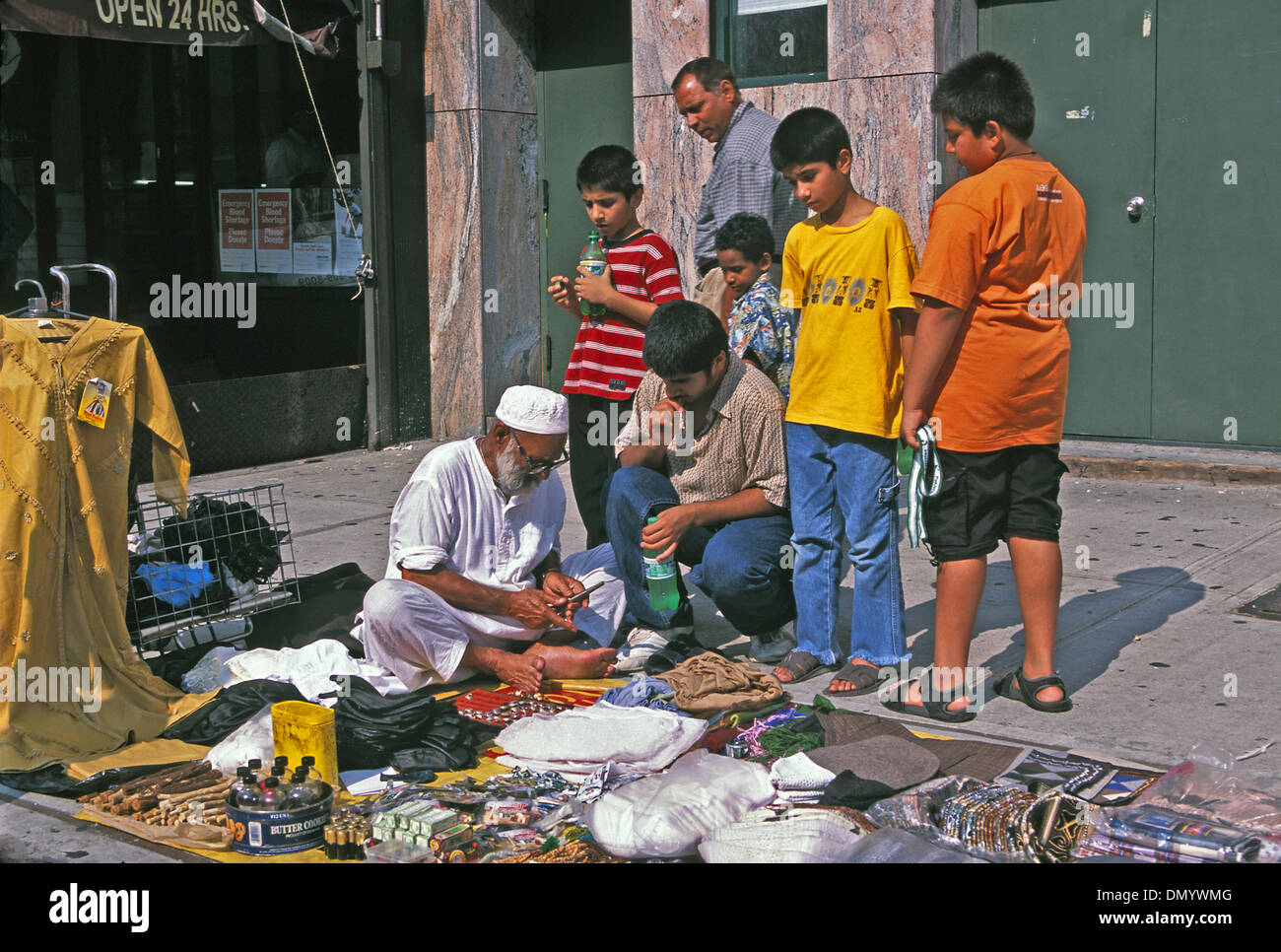 Pakistani neighborhood in Brooklyn, New York. Street vendor selling ...