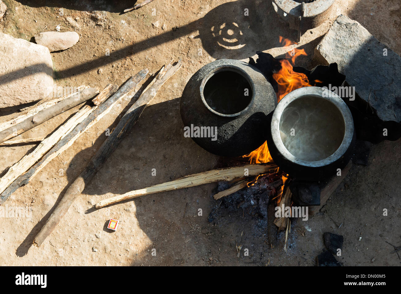 Preparing fire for cooking food in a indian village hi-res stock ...