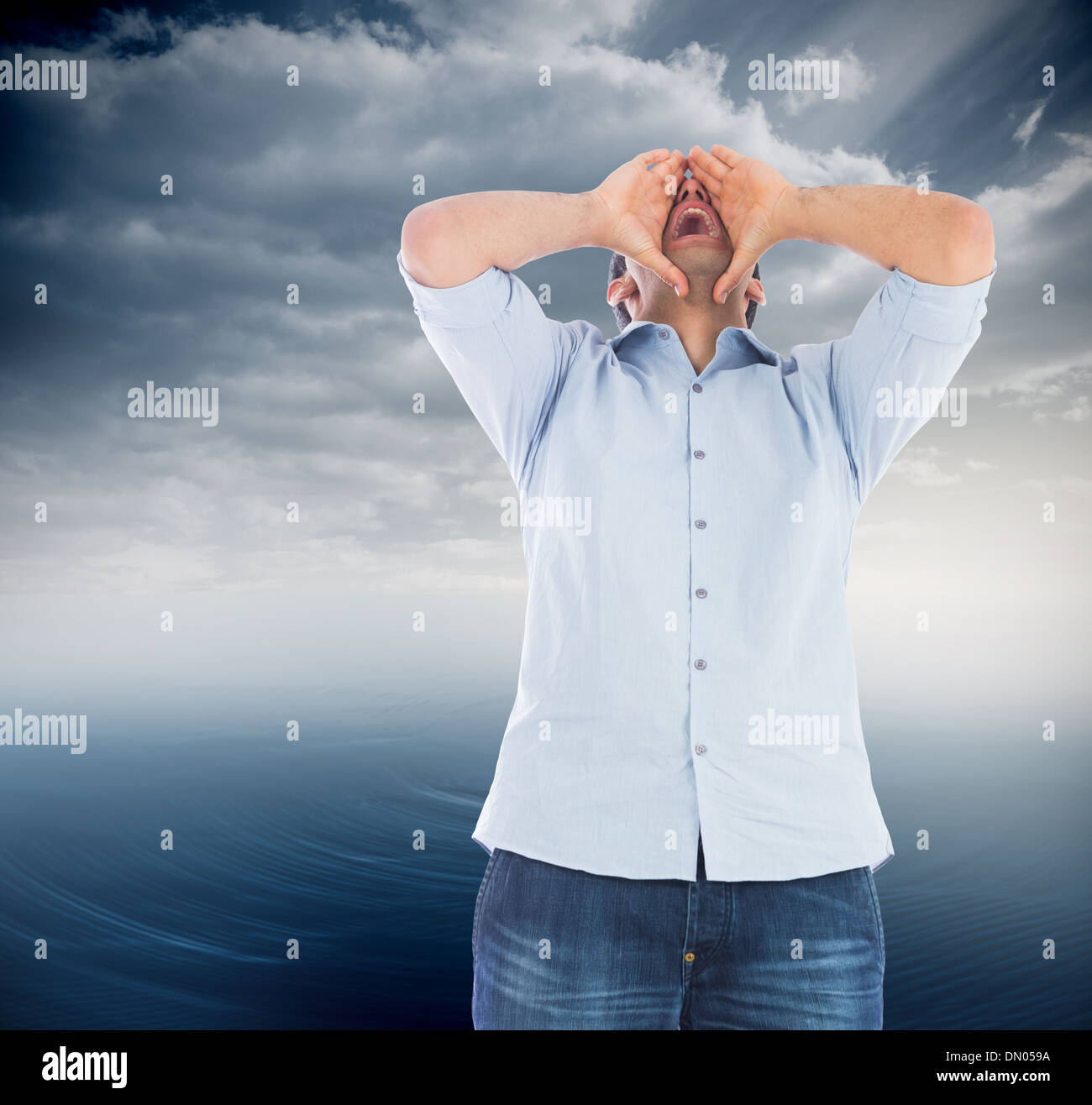 Composite image of shouting casual man standing Stock Photo - Alamy