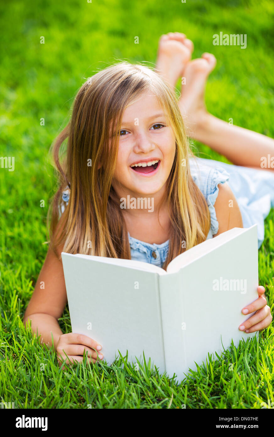 Little Girl Reading Outside
