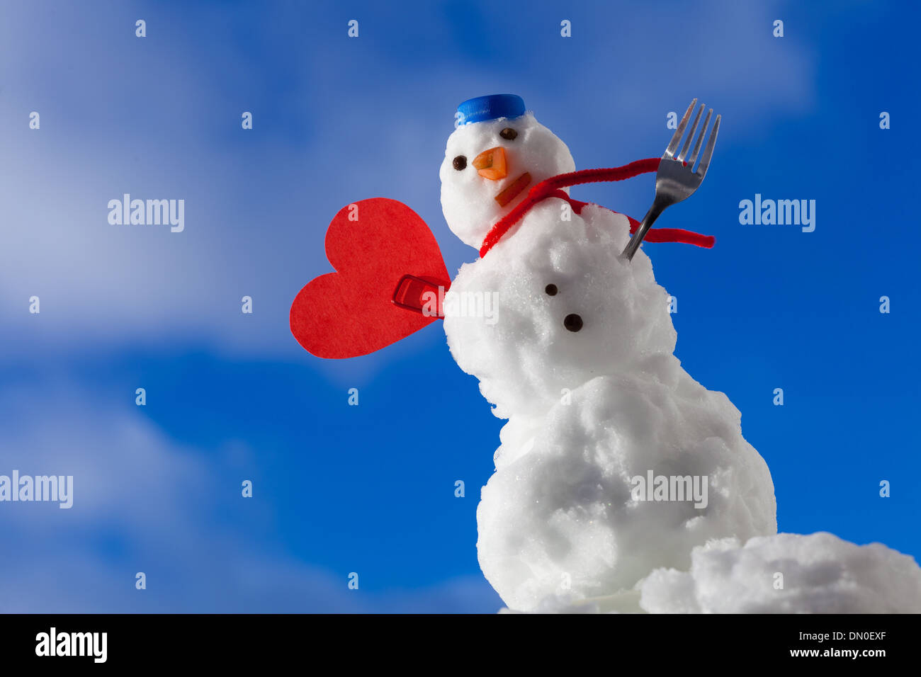 Happy snowman with red heart love symbol in valentine's day. Winter ...
