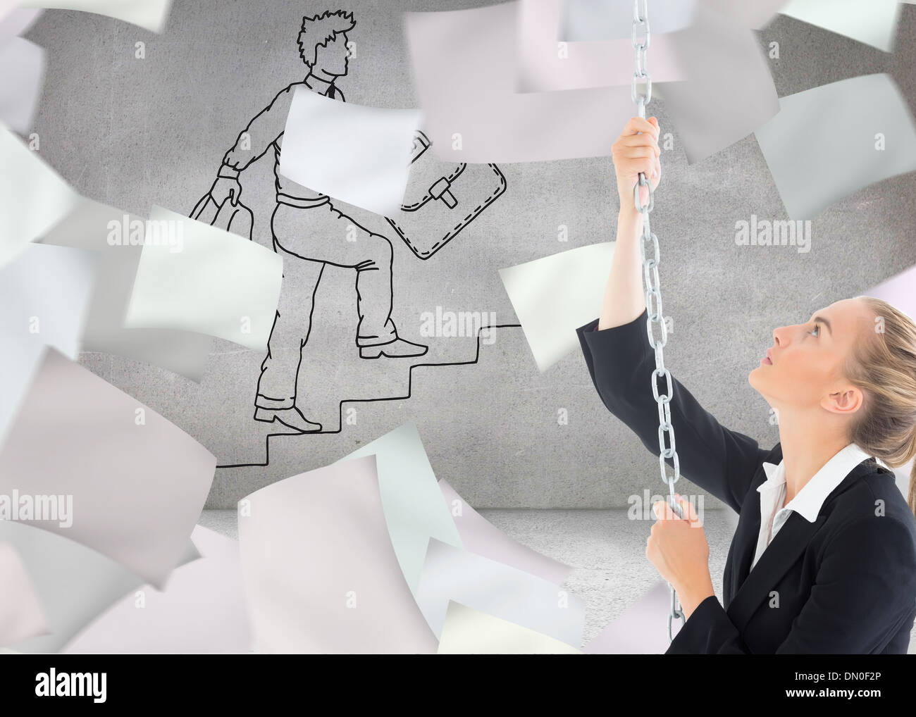 Composite image of businesswoman pulling a chain Stock Photo - Alamy