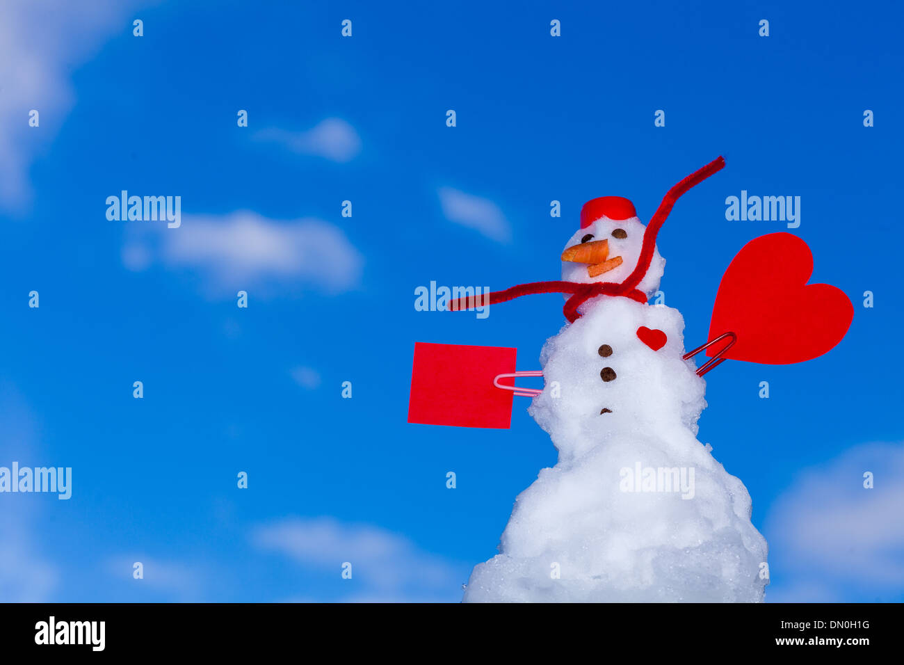 Winter. Funny valentine snowman with paper red heart love symbol for ...